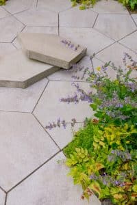 Improve biodiversity: flip a tile and plant a perennial - Perennial Power